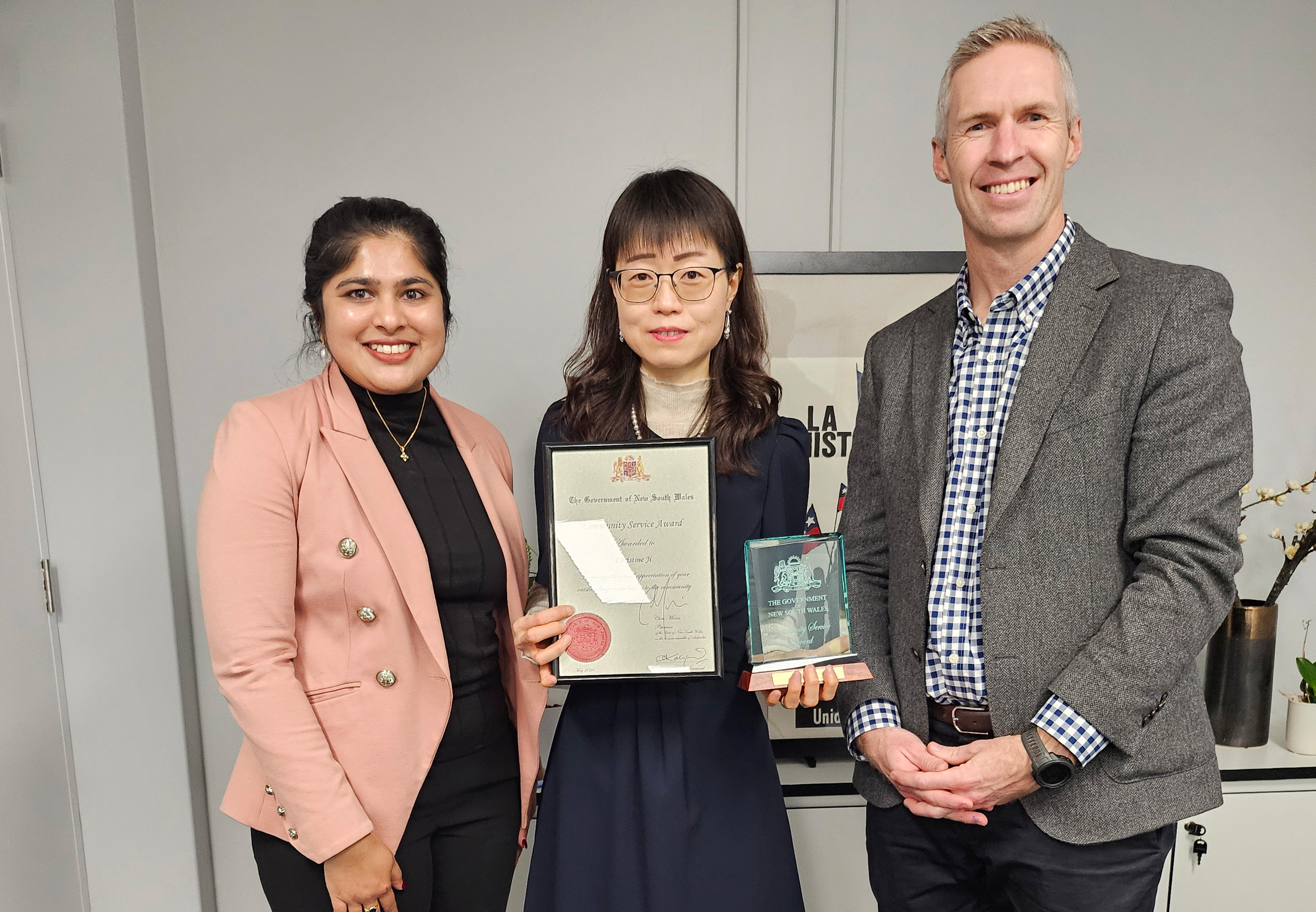 Associate Professor Christine Ji receives Community Service Award - The ...